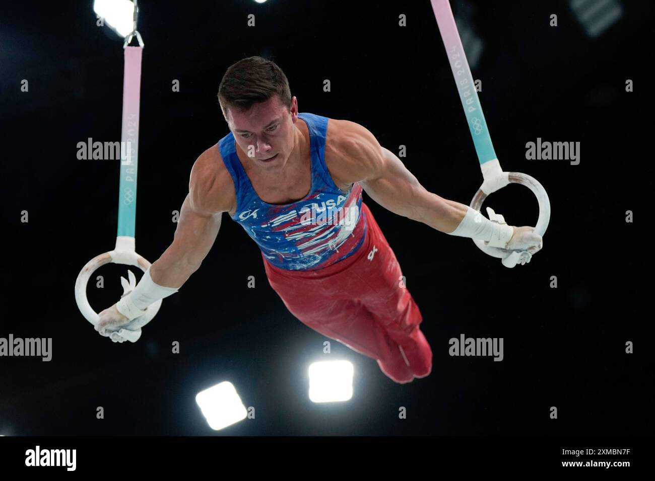 Brody Malone, of United States, competes on the rings during a men's ...