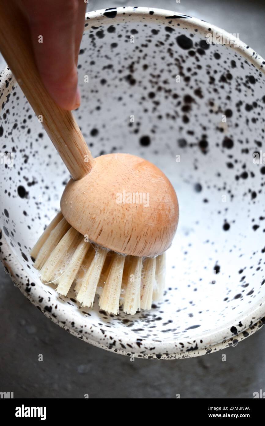photograph showing the process of washing dishes Stock Photo - Alamy