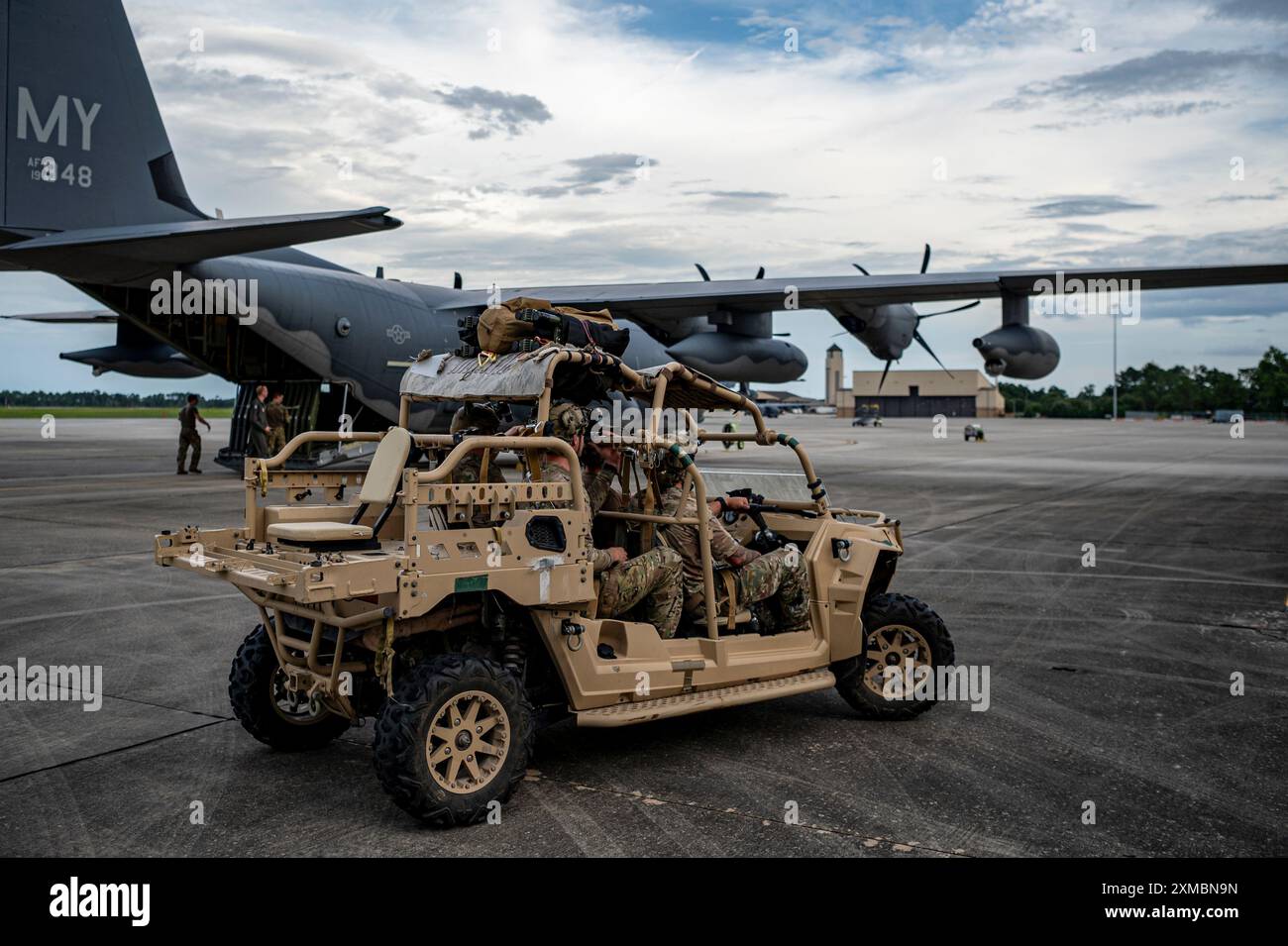 U.S. Air Force Airmen assigned to 38th Rescue Squadron drive on the ...