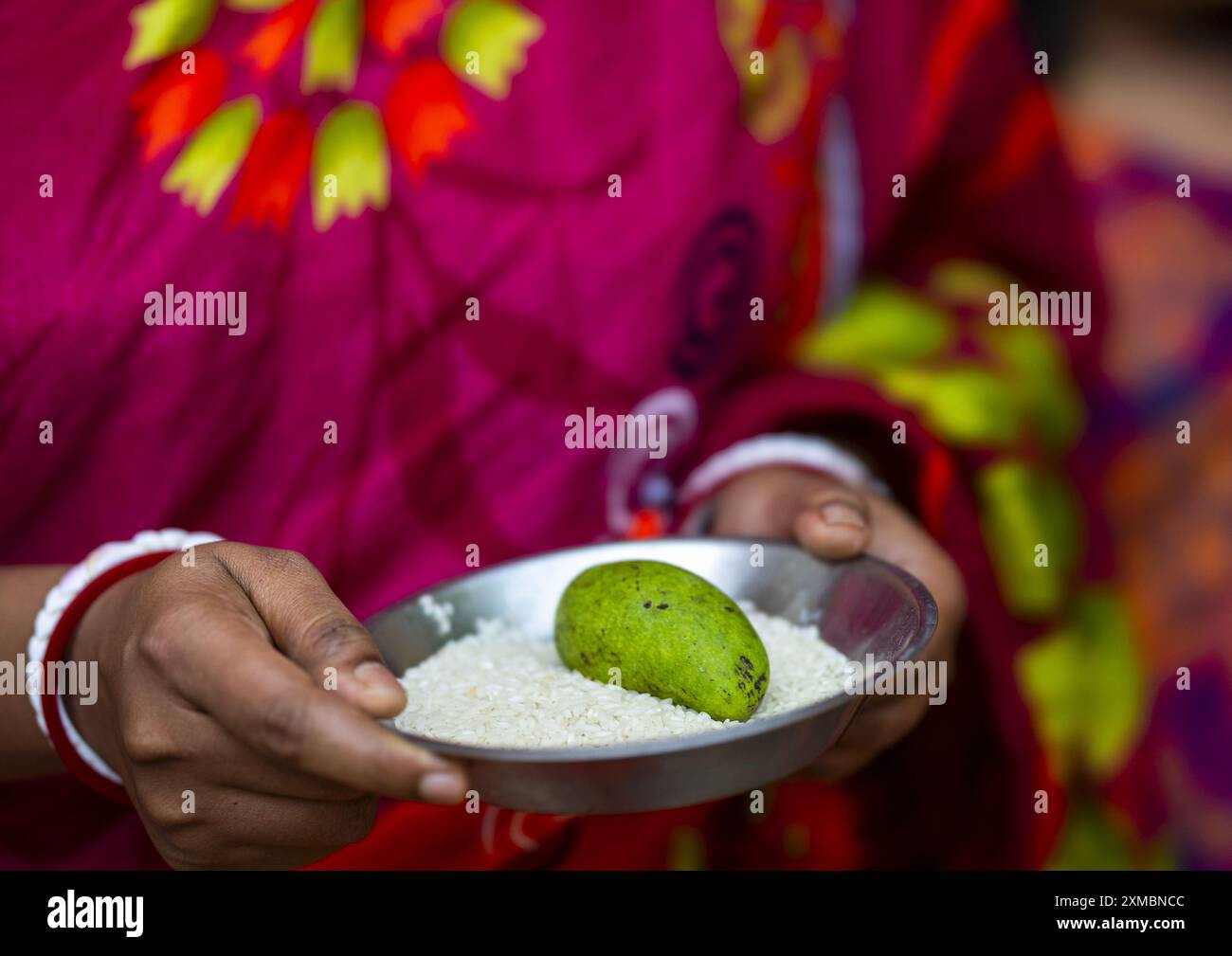 Hindu woman waiting Lord Shiva to offer food at Lal Kach festival ...