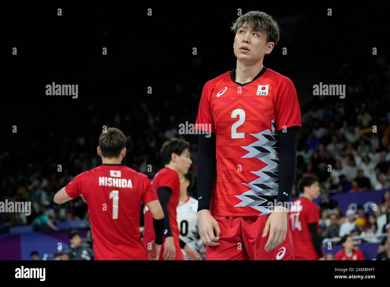 Taishi Onodera, of Japan, reacts after his team missed a point during ...