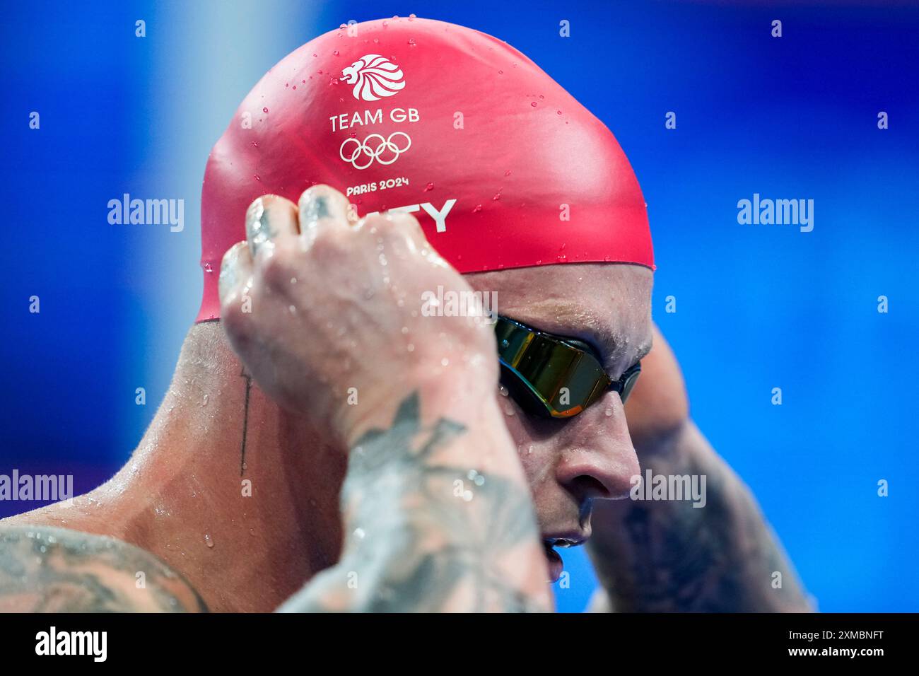 Adam Peaty, of Britain, competes during a heat in the men's 100-meter ...
