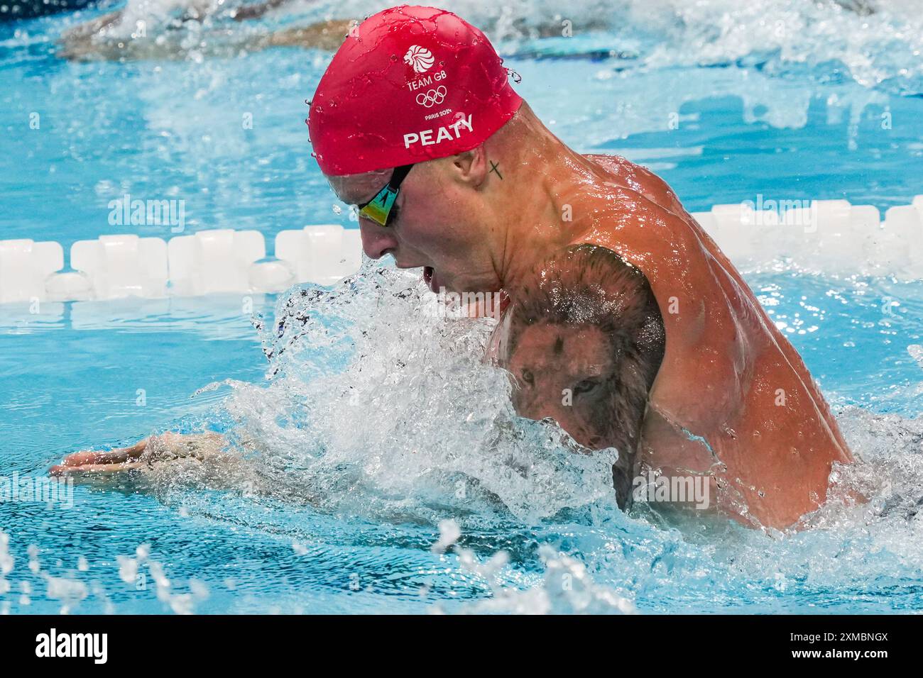 Adam Peaty, of Britain, competes during a heat in the men's 100-meter ...