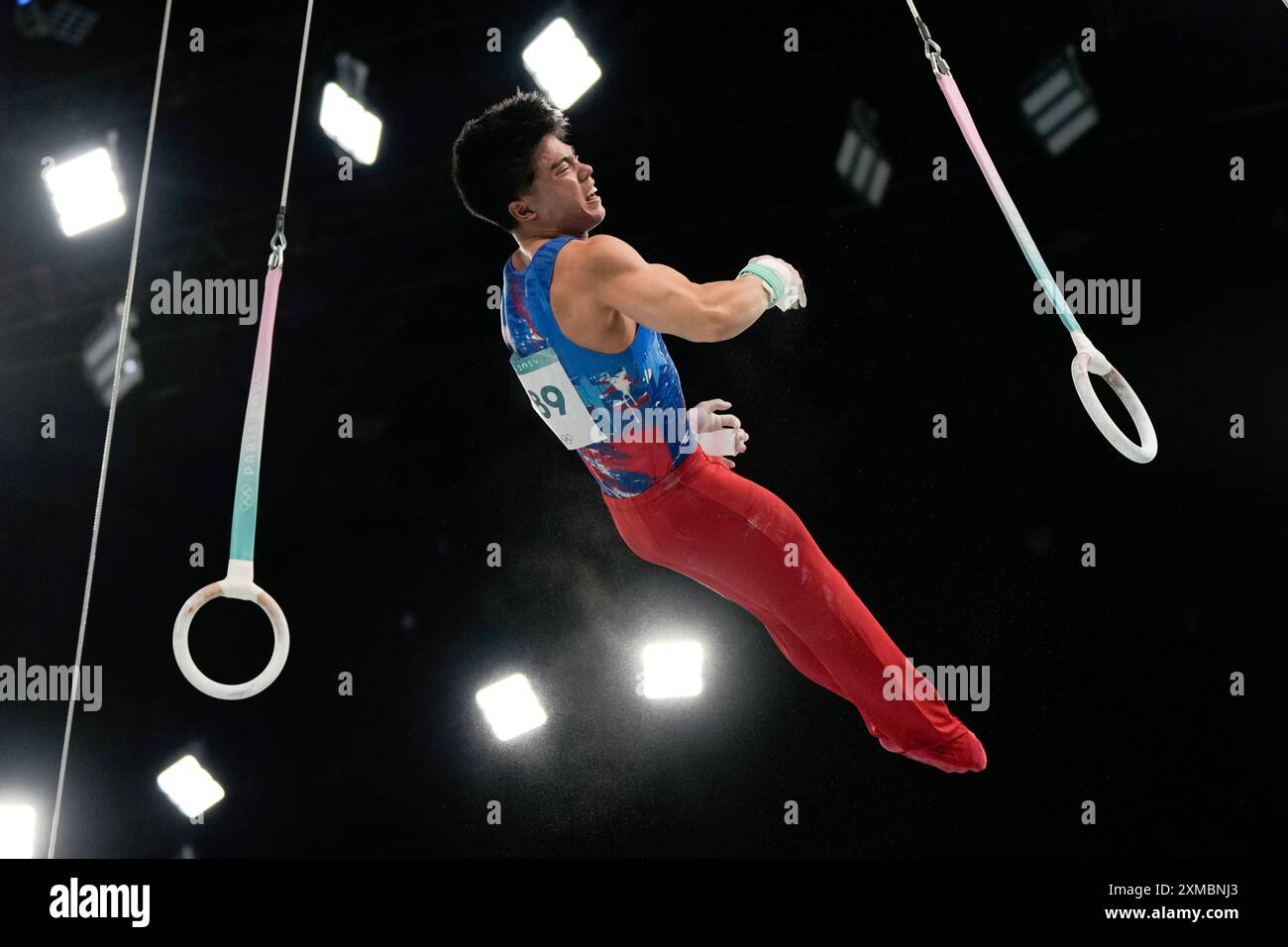 Asher Hong, of United States, competes on the rings during a men's ...
