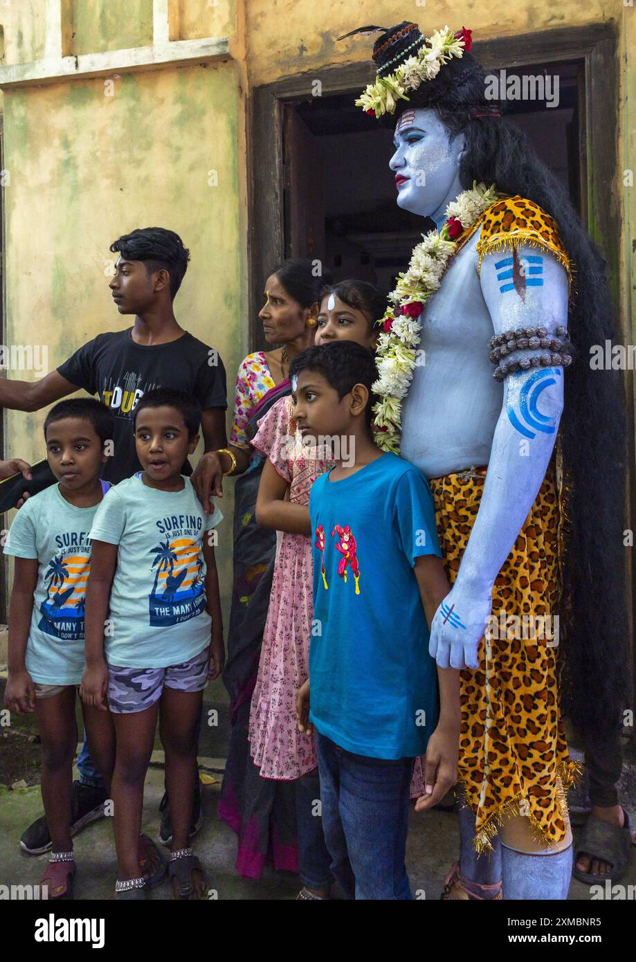 Lord Shiva procession with devotees at Lal Kach festival, Dhaka Division, Tongibari, Bangladesh ...
