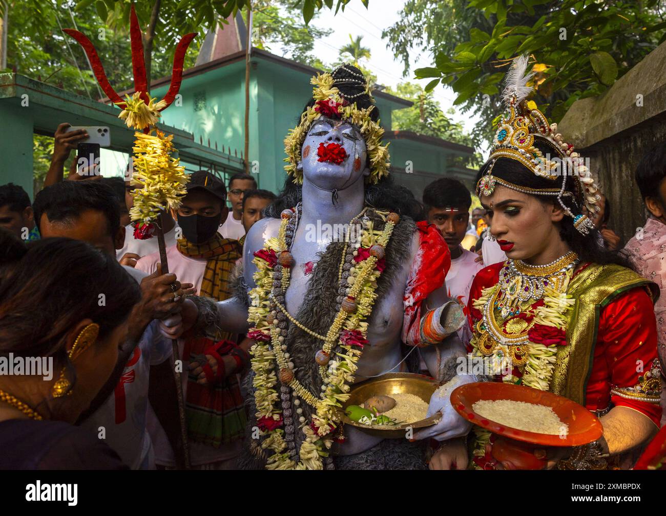 Lord Shiva and Parvati procession with devotees during Lal Kach festival, Dhaka Division ...