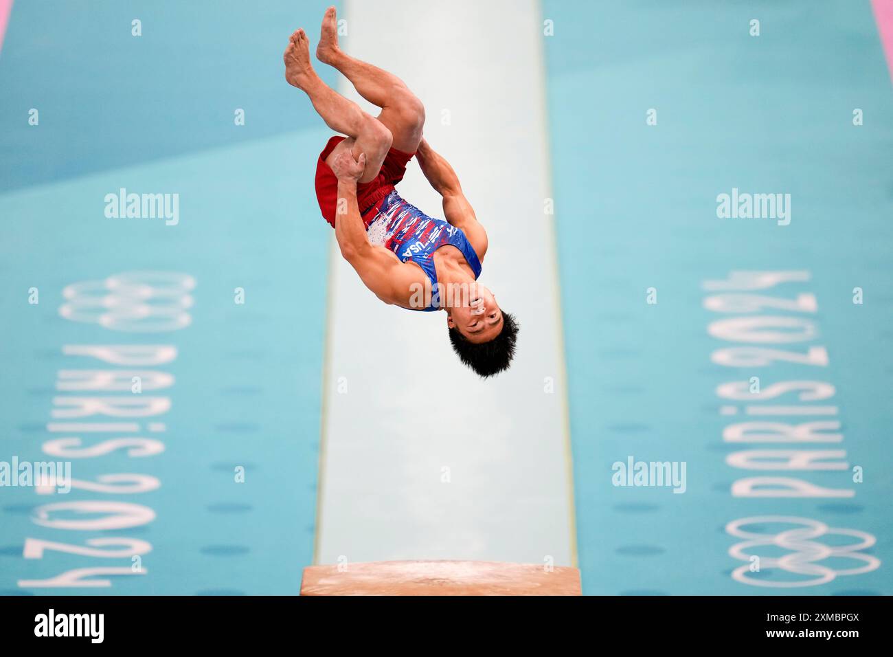 Asher Hong, of United States, competes on the vault during a men's ...