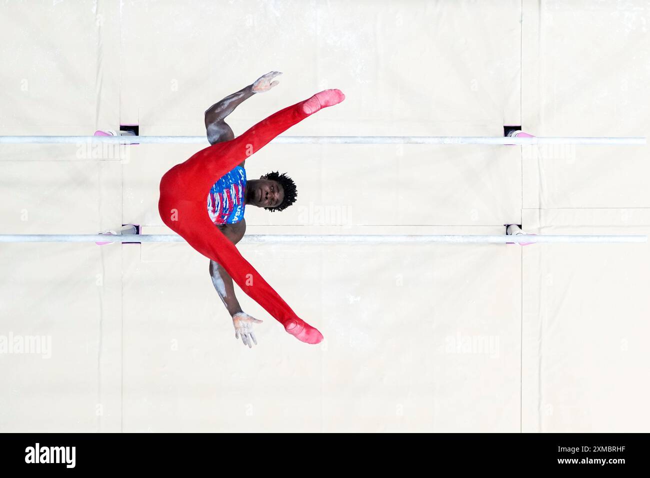 Frederick Richard, of United States, performs on the parallel bars ...