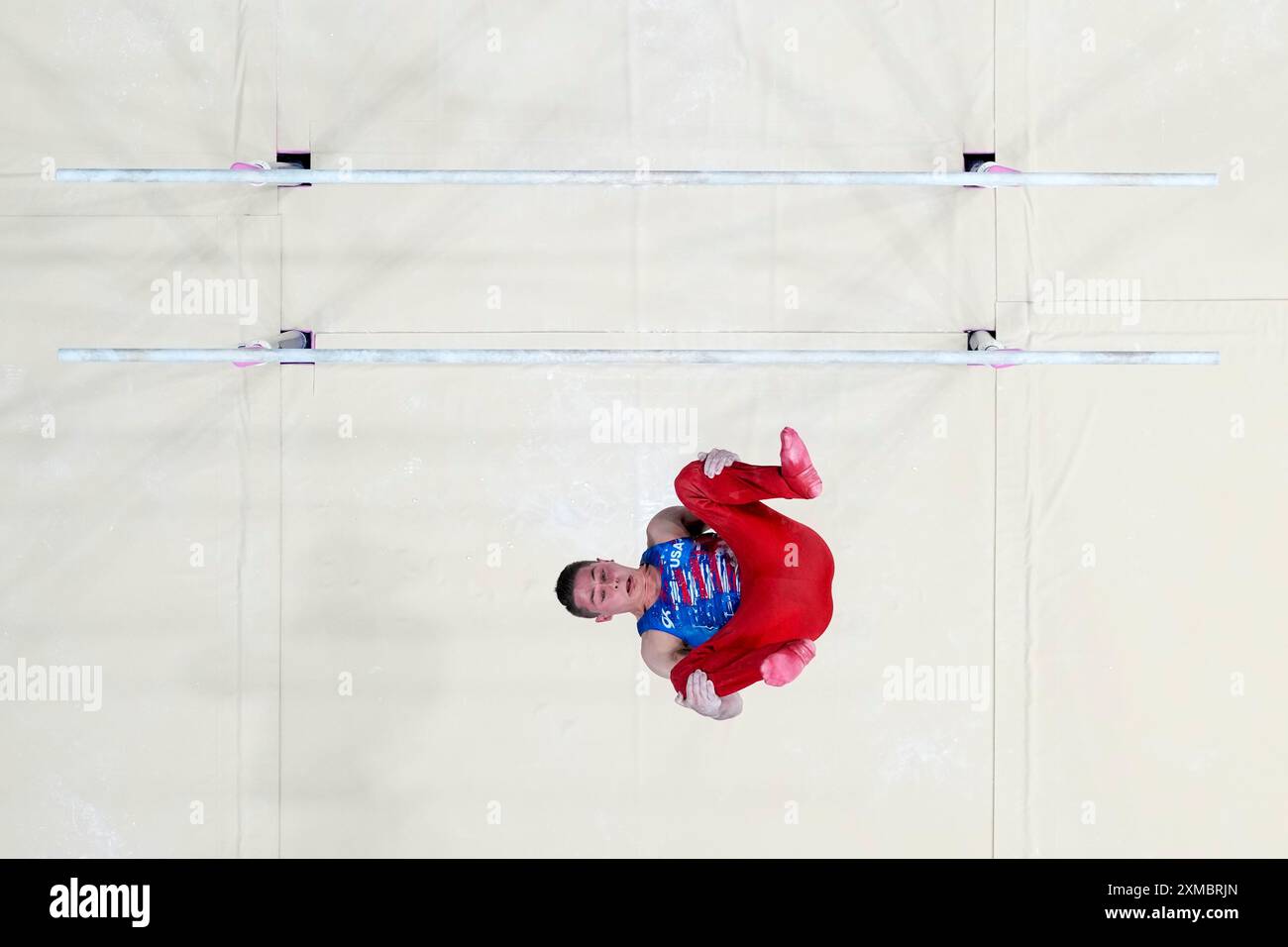 Paul Juda, of United States, performs on the parallel bars during a men ...
