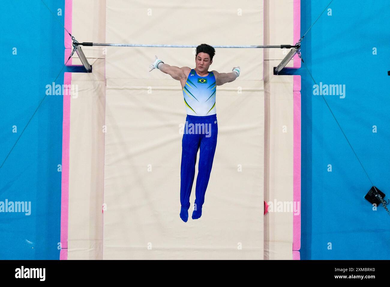 Artur Davtyan, of Armenia, performs on the bars during a men's artistic ...