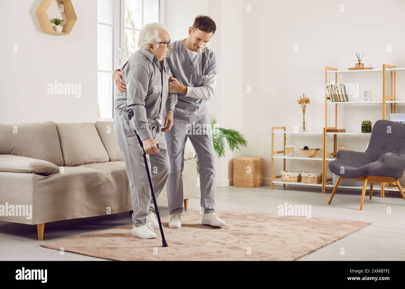 Senior nursing, health care of elderly people, young male geriatric ...