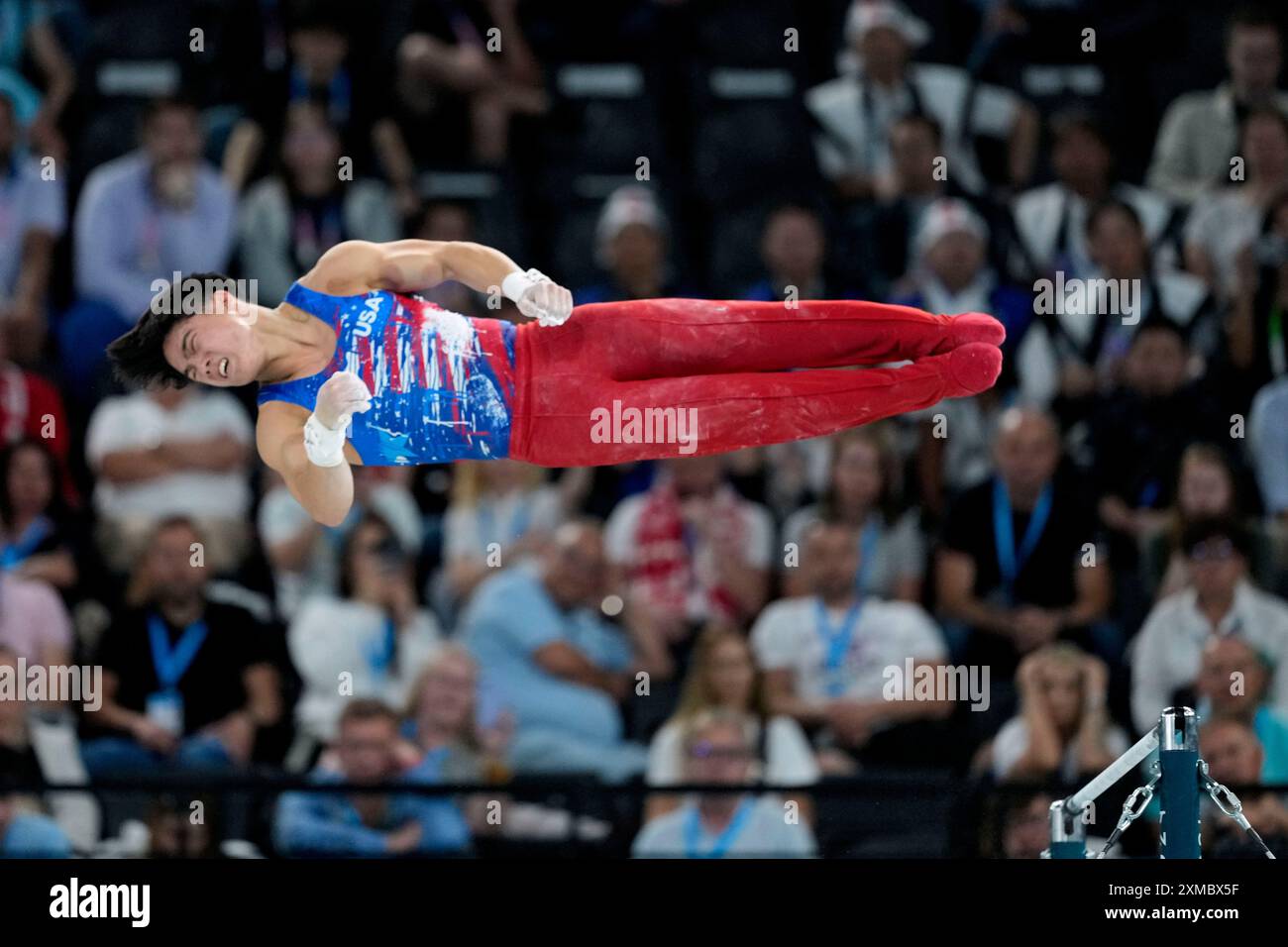 Asher Hong, of United States, competes on the horizontal bar during a ...