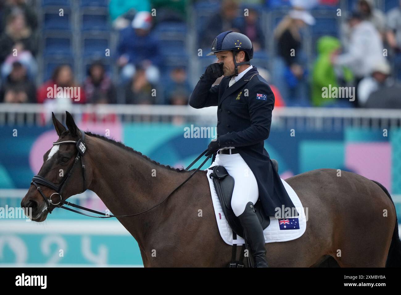 Australia's Shane Rose reacts after competing with his horse Virgil ...