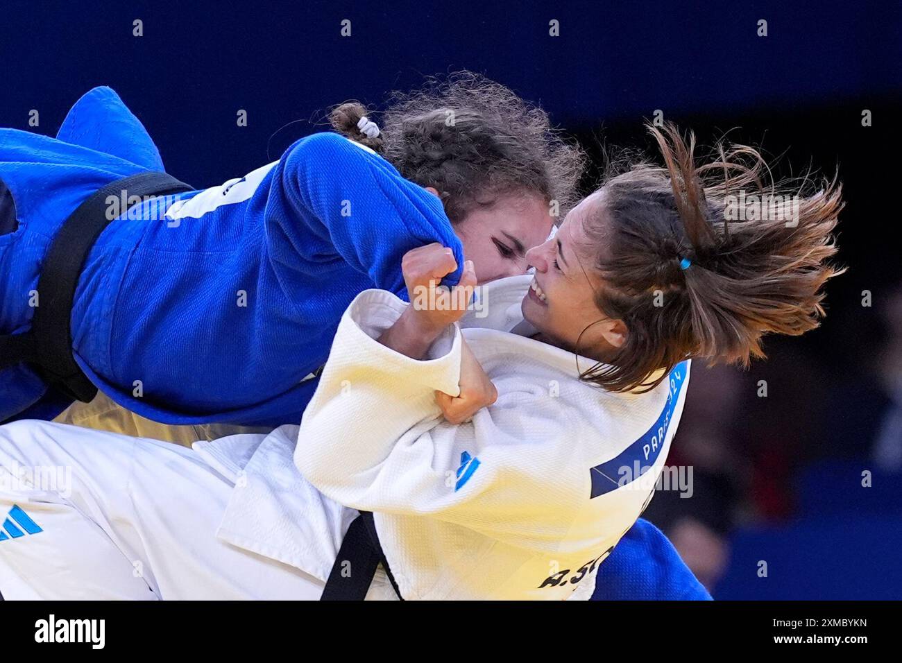 Italy's Assunta Scutto and Sweden's Tara Babulfath, left, compete ...