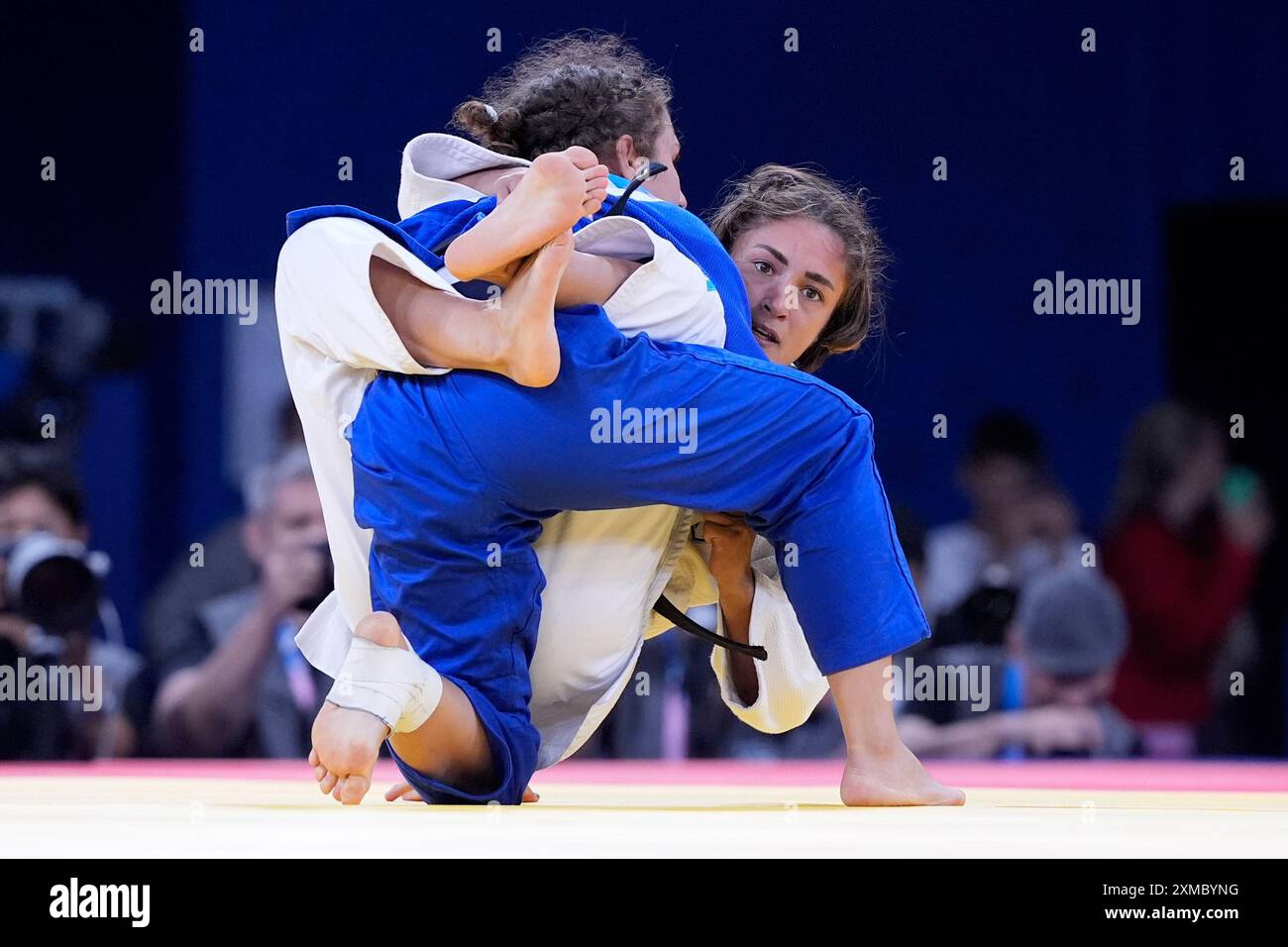 Italy's Assunta Scutto, right, and Sweden's Tara Babulfath compete ...