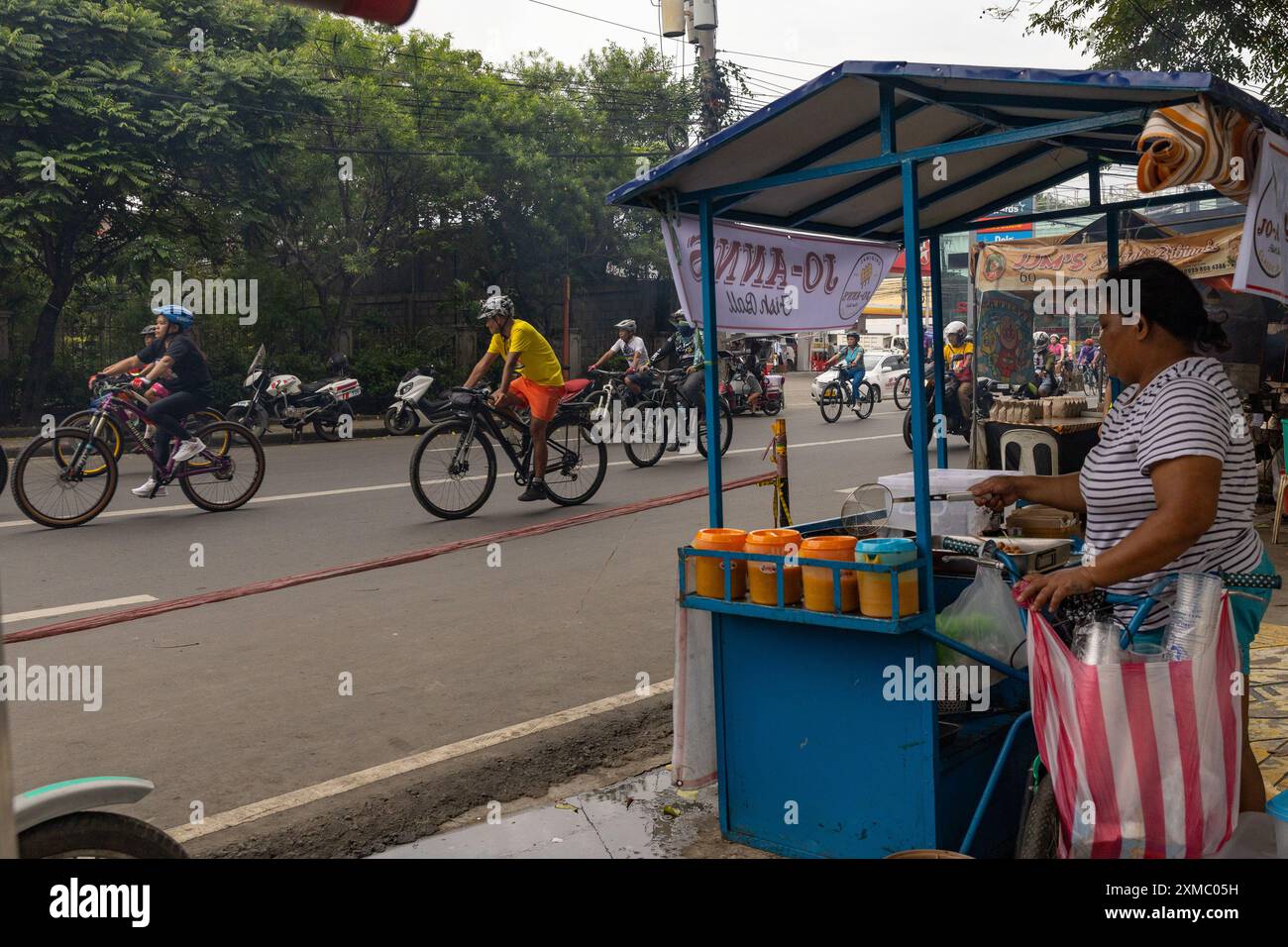 Filipino bike enthusiasts cycled around Iloilo City in a fun ride to ...