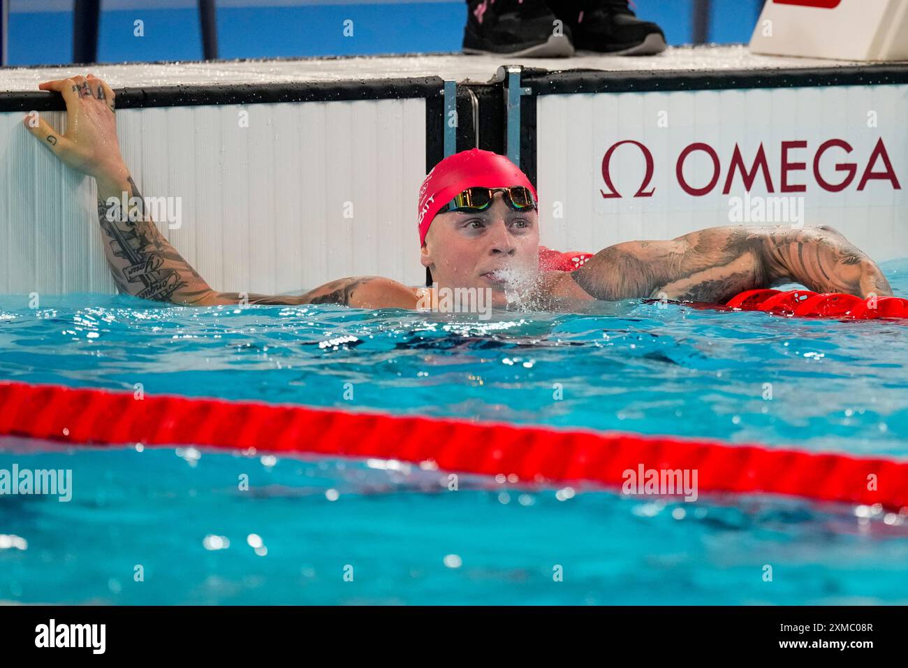 Adam Peaty, of Britain, reacts after his heat in the men's 100-meter ...