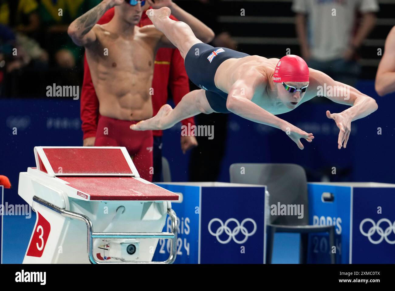 Duncan Scott of Britain dives in for his leg of the men's 4x 100m ...