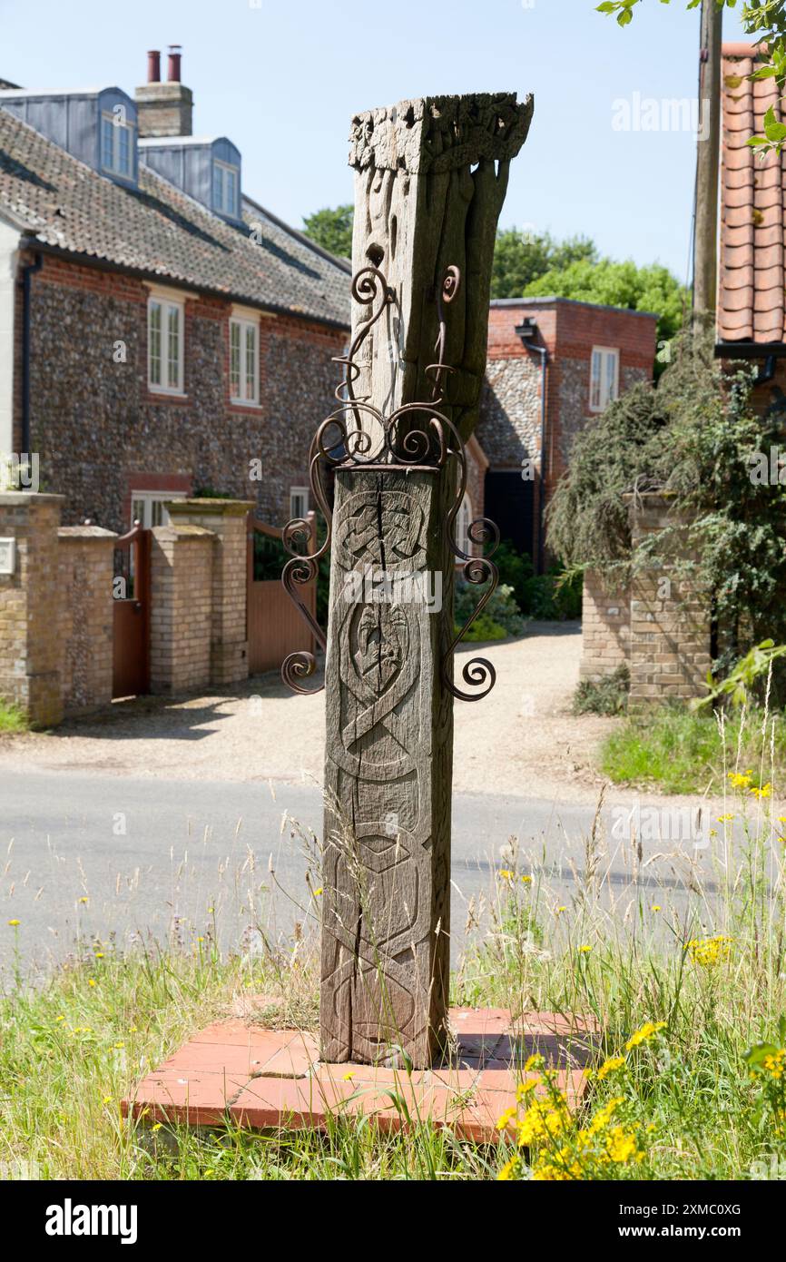 Carved wooden village sign, Bale, Norfolk Stock Photo - Alamy