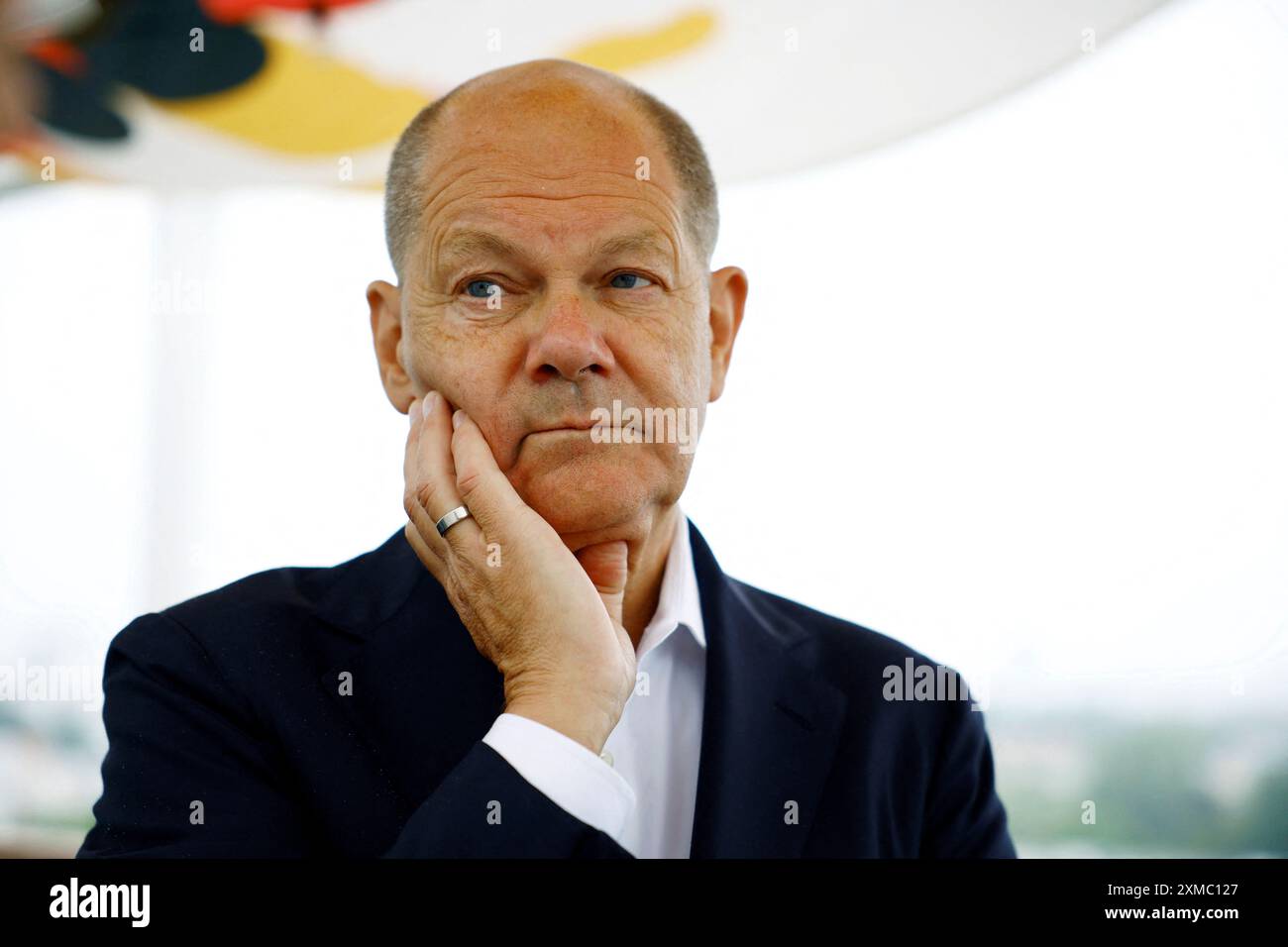 German Chancellor Olaf Scholz visits the Olympic Village during the ...