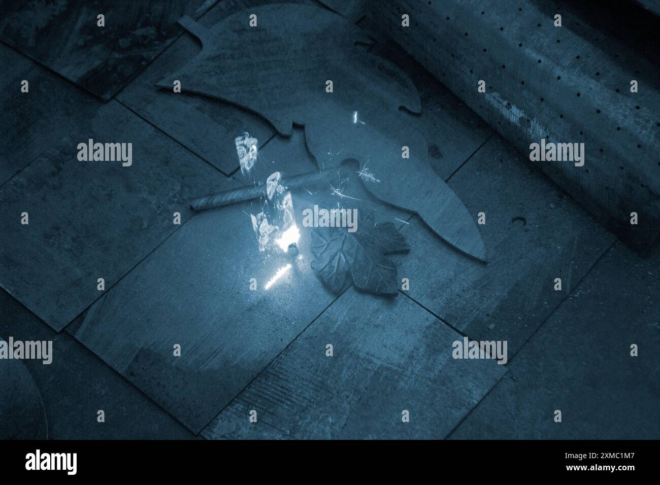 Laser cleaning of metal. The laser beam cleans the metal surface from ...