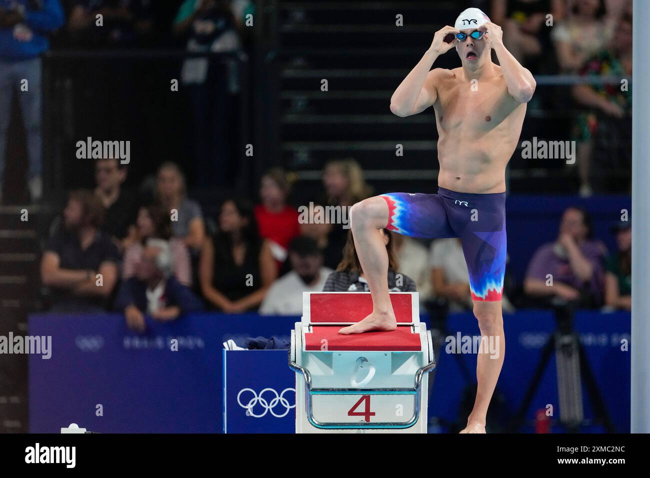 Nic Fink, of the the United States, prepares to start in his heat in ...