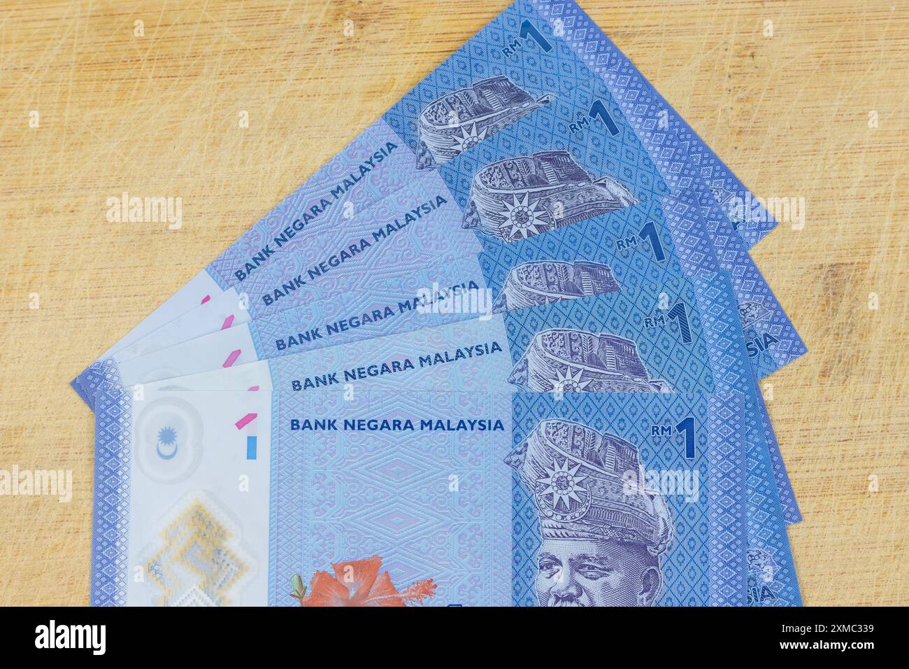 Malaysian currency, One ringgit banknote on a wooden background Stock ...
