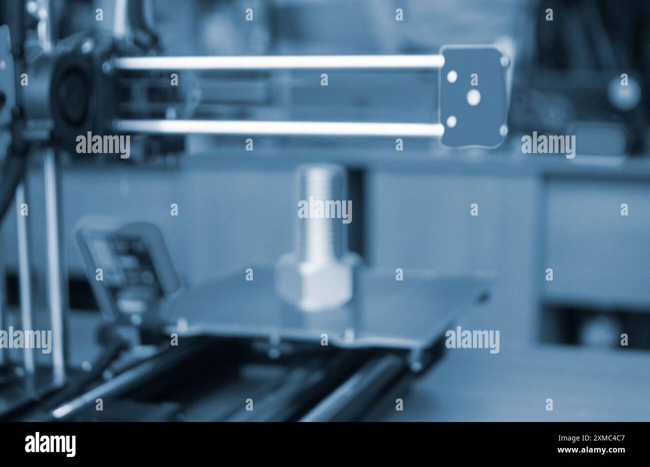 3D printer printing prototype of bolt from molten plastic. Creating ...