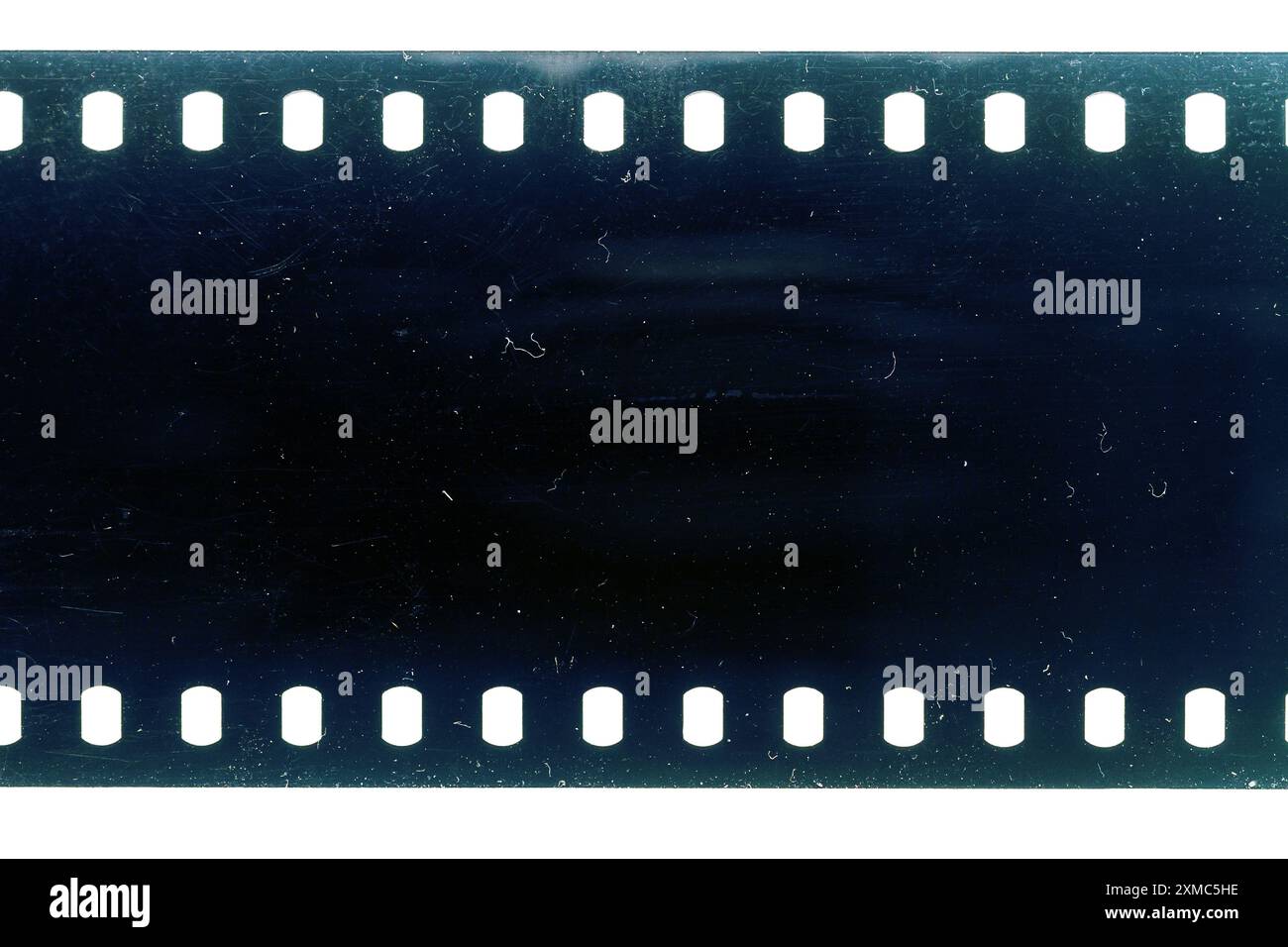Dusty and grungy 35mm film texture or surface. Perforated scratched ...