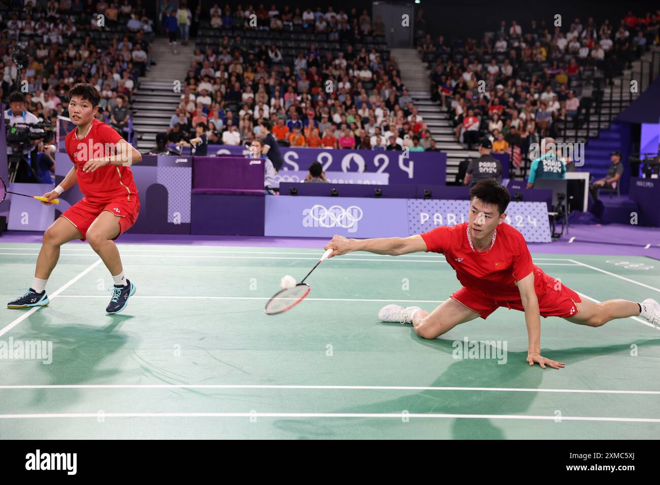 Paris, France. 27th July, 2024. Feng Yanzhe (R)/Huang Dongping of China compete during the mixed ...
