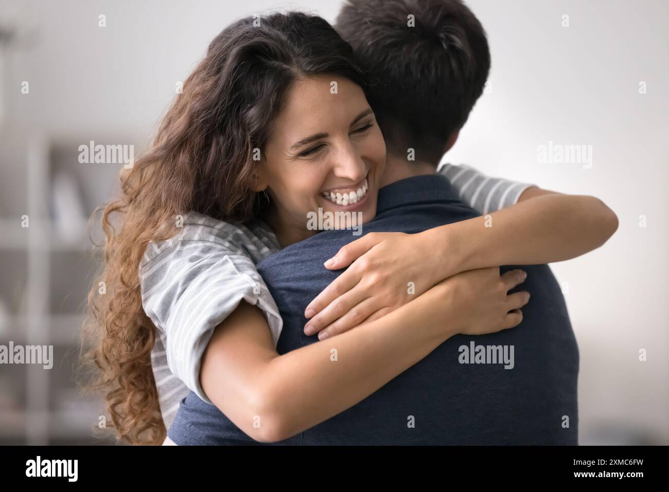 Grateful husband hugging wife woman hi-res stock photography and images ...