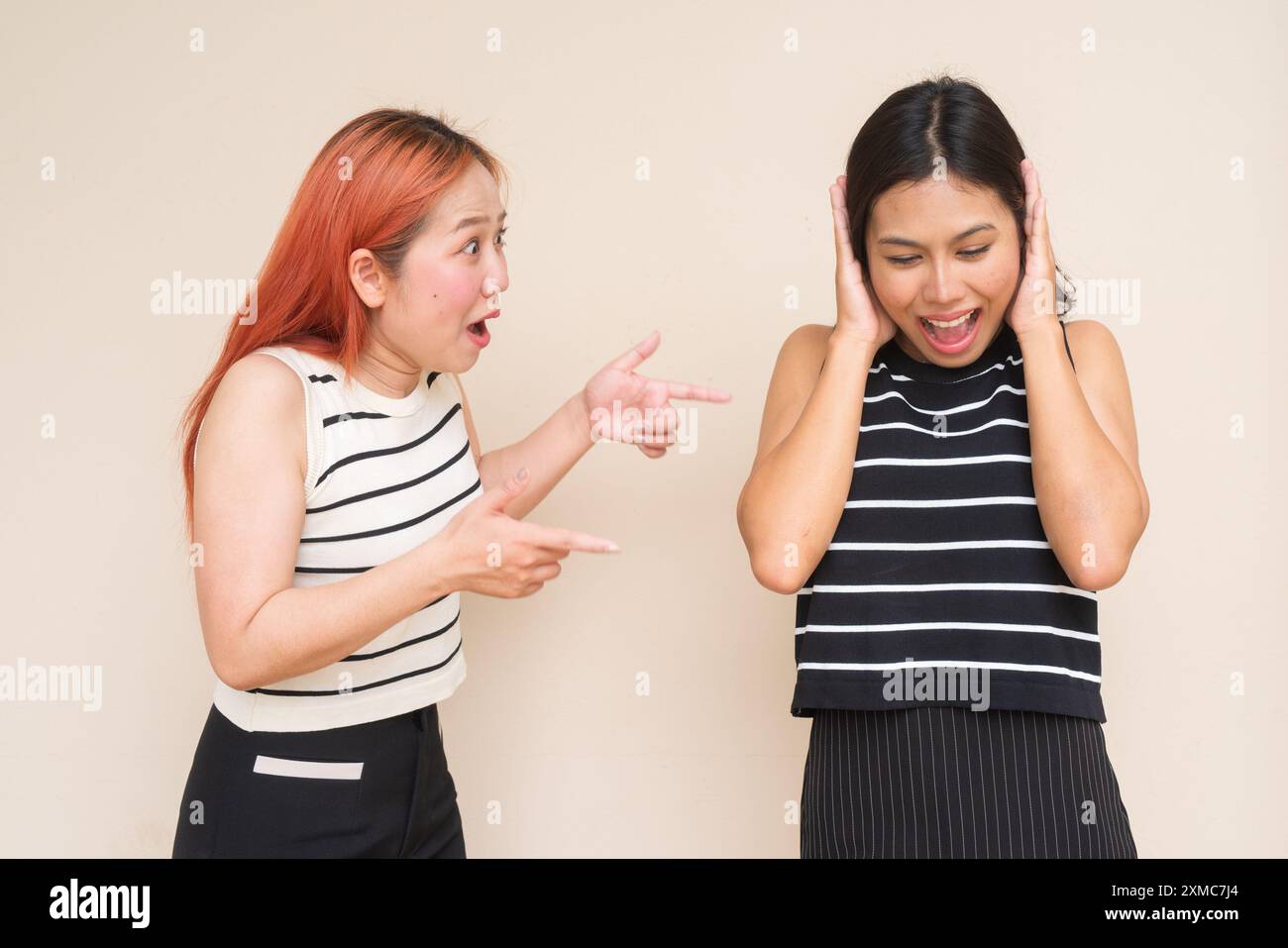 Two people screaming at each other hi-res stock photography and images ...