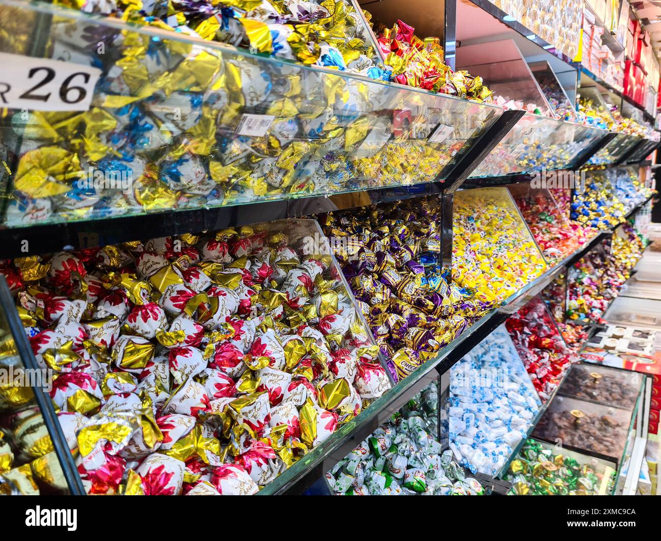 Lots of colorful candy in a candy store in the shopping mall of plaza ...