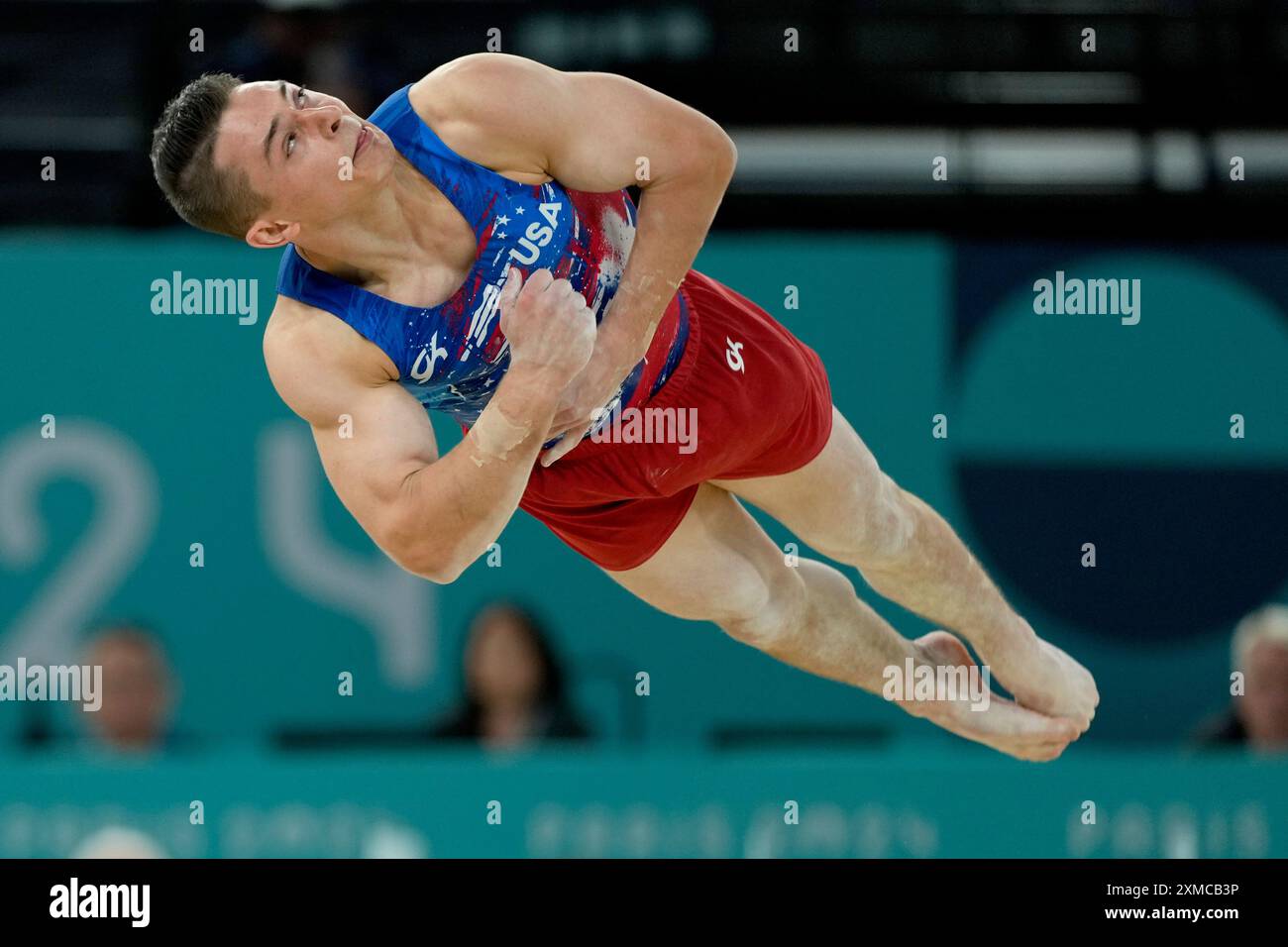 Paul Juda, of United States, competes on the floor exercise during a ...