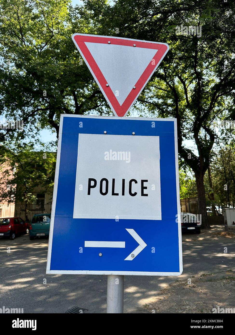 Police road sign at the end of the street Stock Photo - Alamy