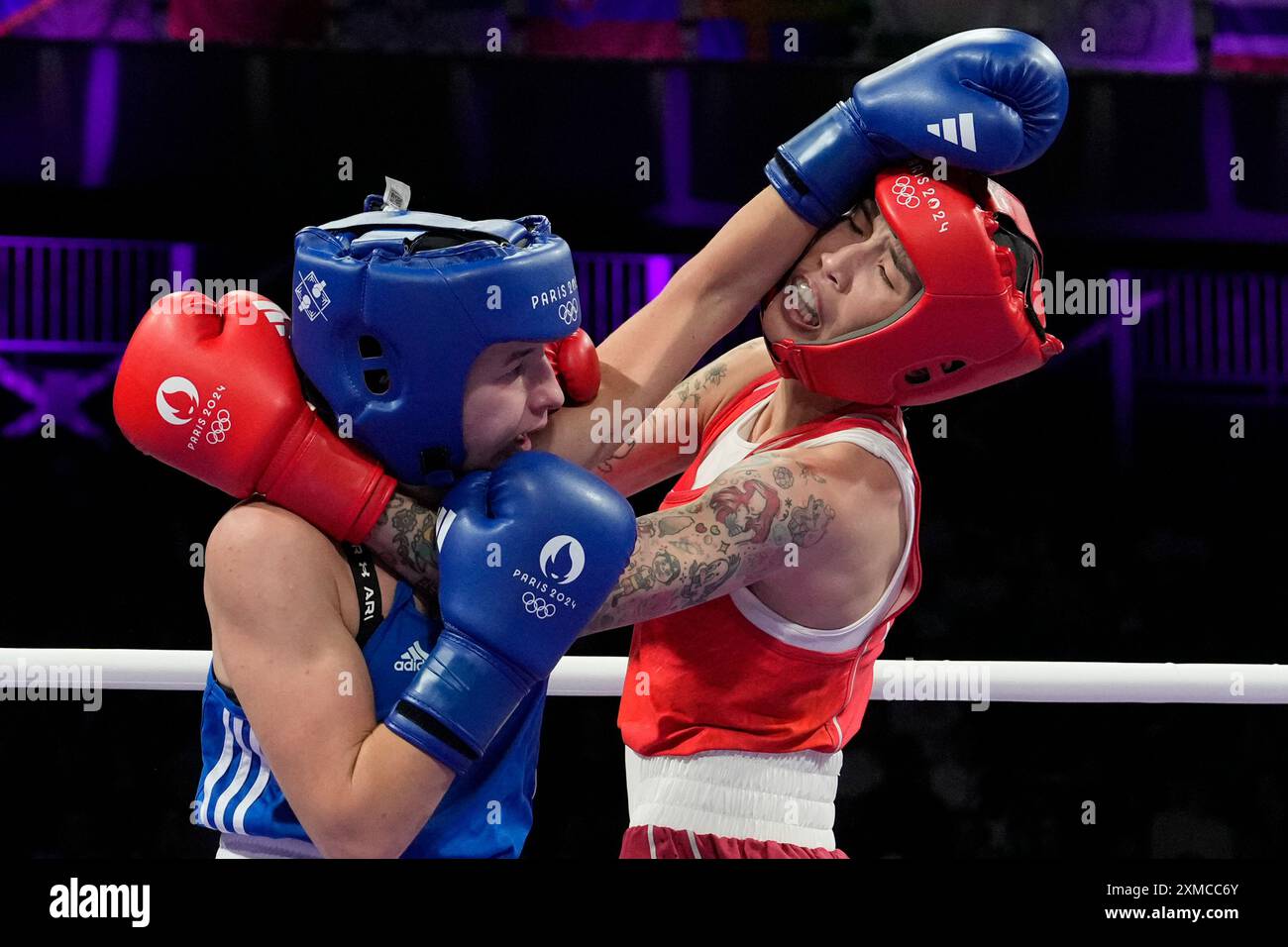 Taiwan's Huang Hsiao-Wen, right, fights Montenegro's Bojana Gojkovic in ...