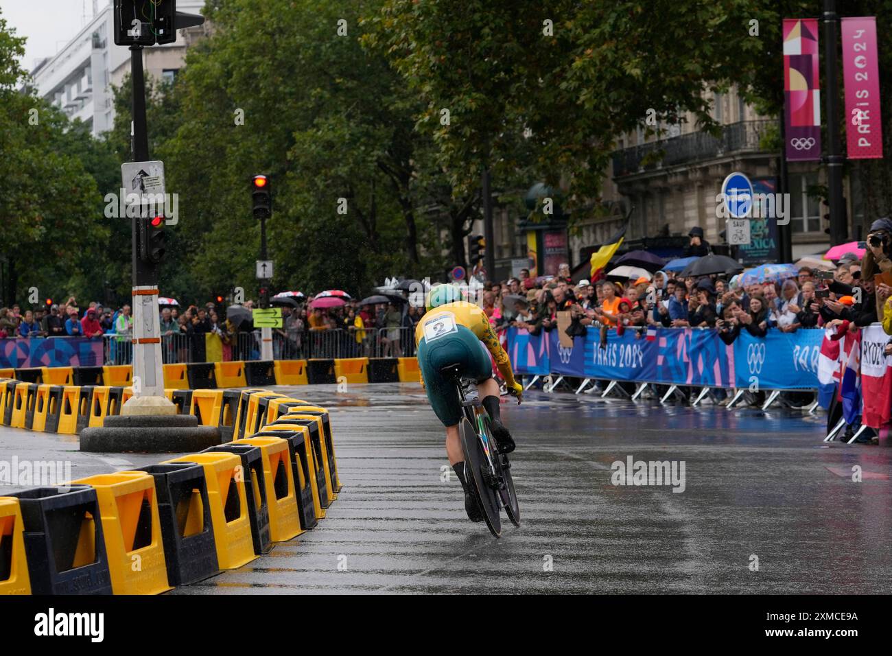 Grace Brown, of Australia, competes in the women's cycling time trial ...