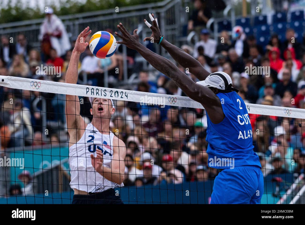 Andrew Benesh of the United States, left, and Cuba's Jorge Luis Alayo ...