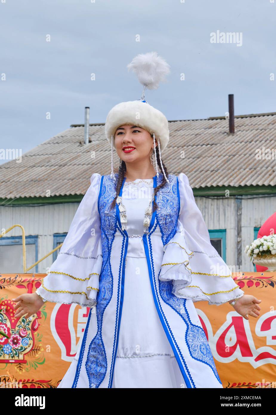 Portrait of young attractive Asian girl in national Bashkir costume ...
