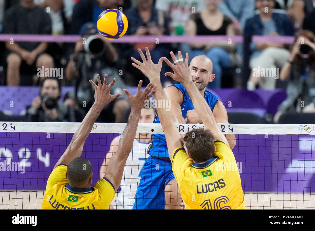 Gianluca Galassi, of Italy, spikes the ball during the group B ...