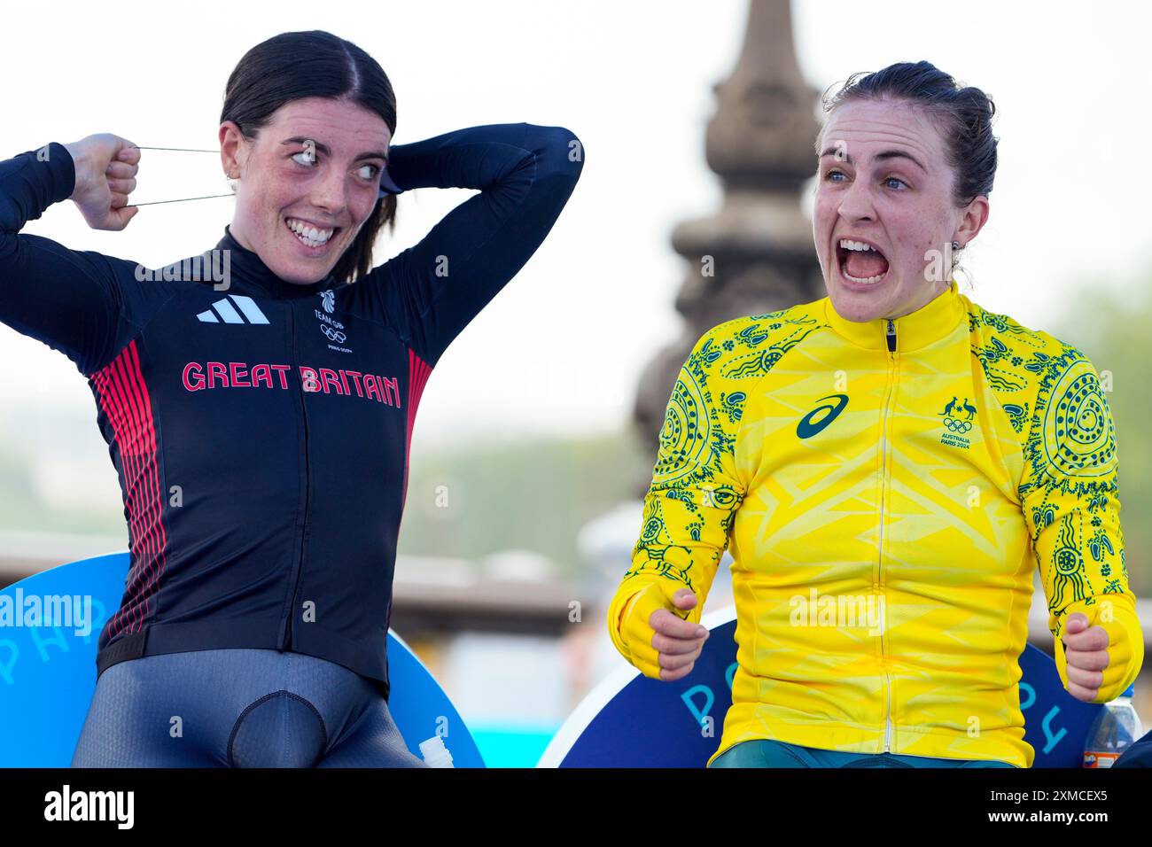 Grace Brown, of Australia, right, celebrates next to second placed Anna ...