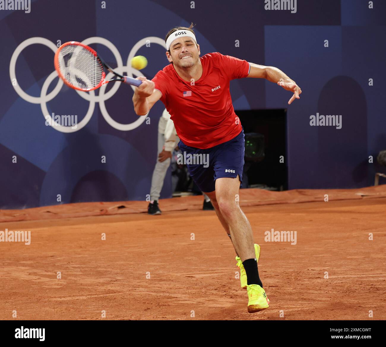 Paris, France. 27th July, 2024. USA'S Taylor Fritz plays a forehand in ...