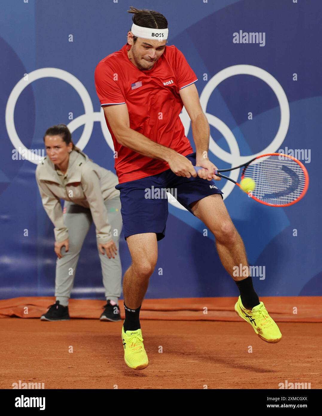 Paris, France. 27th July, 2024. USA'S Taylor Fritz plays a backhand in ...