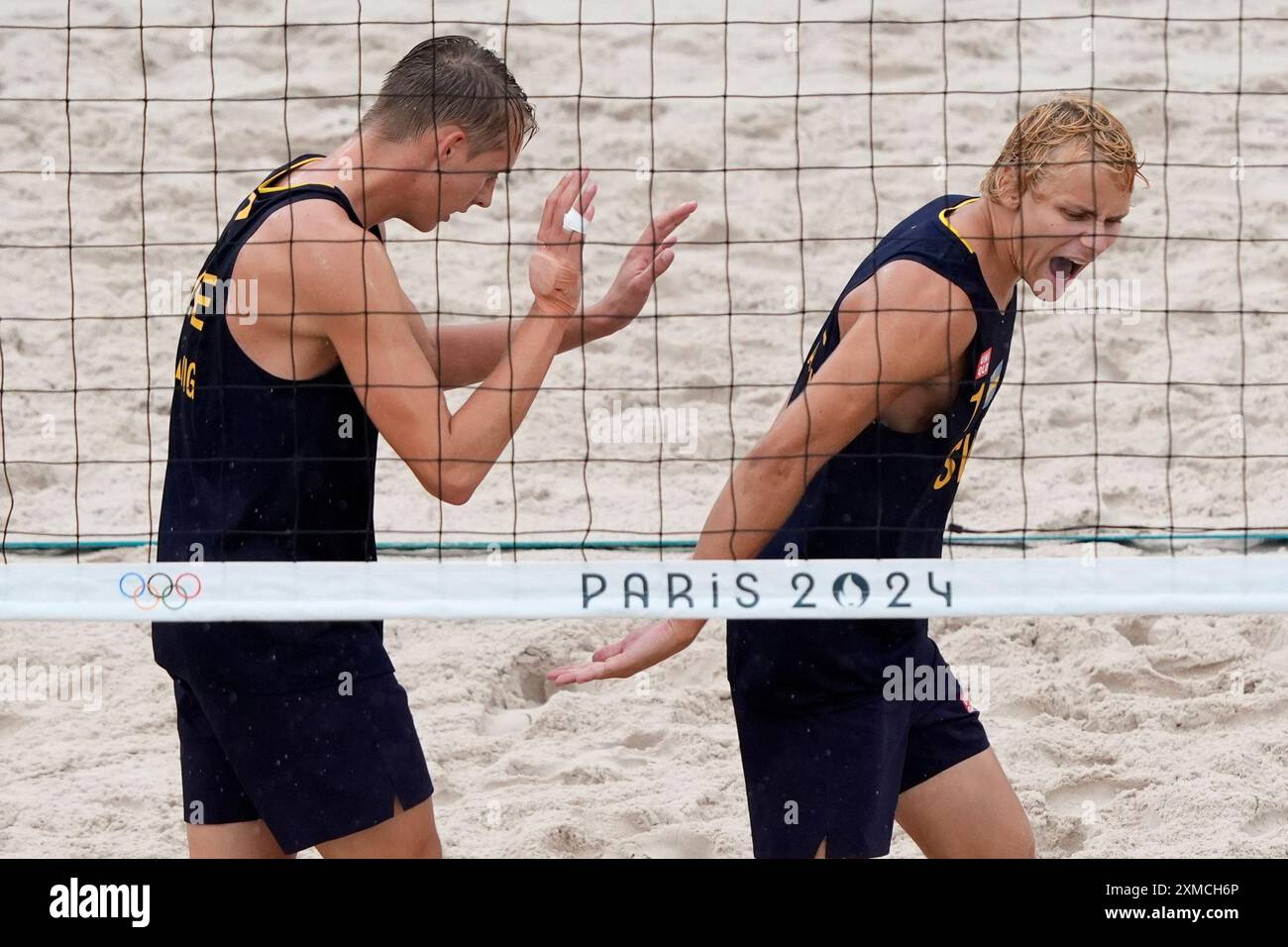 Sweden's Jonatan Hellvig, left, celebrates with teammate David Ahmad ...