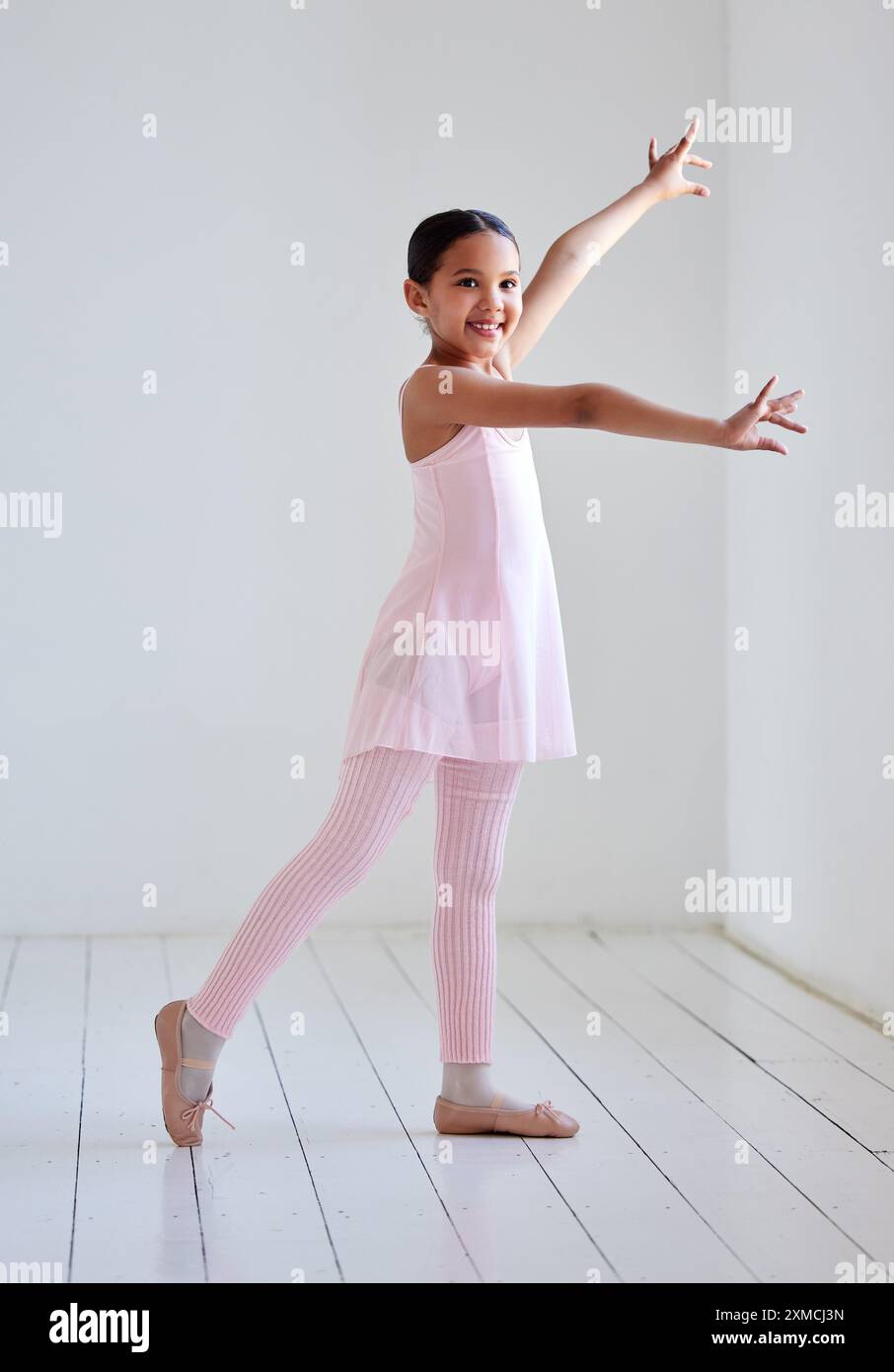Girl, child and ballet practice in studio, dance training and ballerina ...
