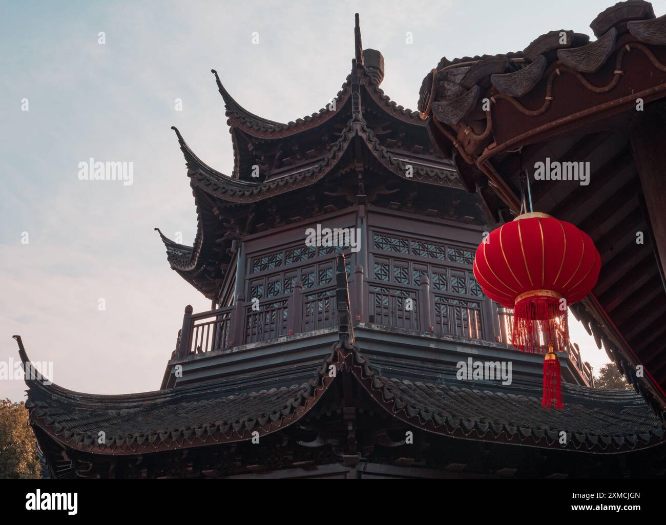 Traditional chinese architectural structure with red lantern in ...