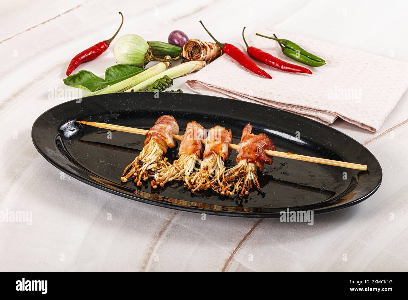 Thai Street foof satay with bacon and mushroom enoki skewer Stock Photo ...