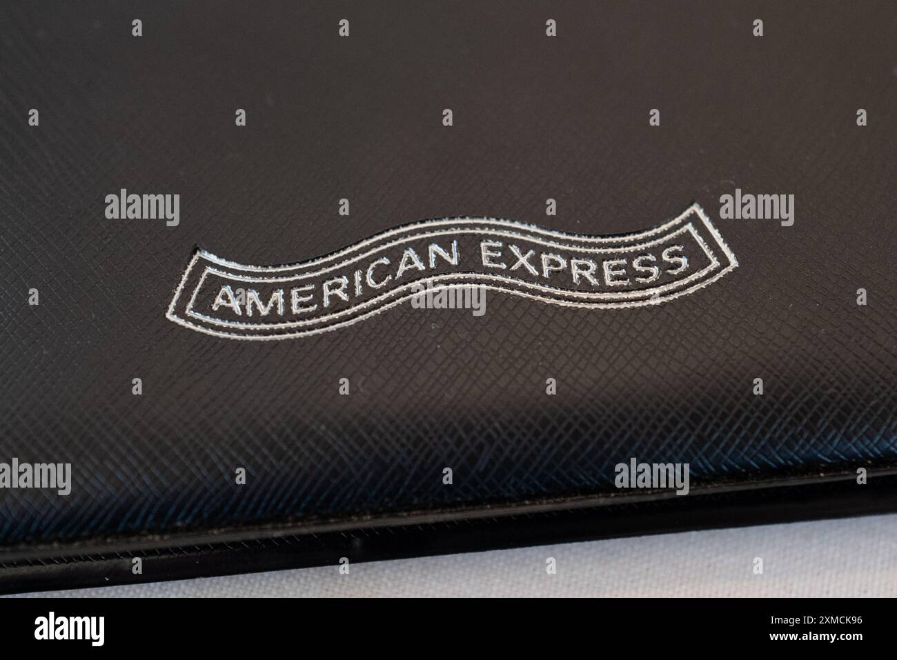 Close-up of American Express logo on a restaurant check holder, Half ...