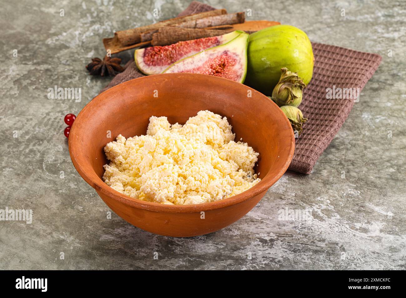 Delicous sheep cottage cheese curd served fig Stock Photo - Alamy
