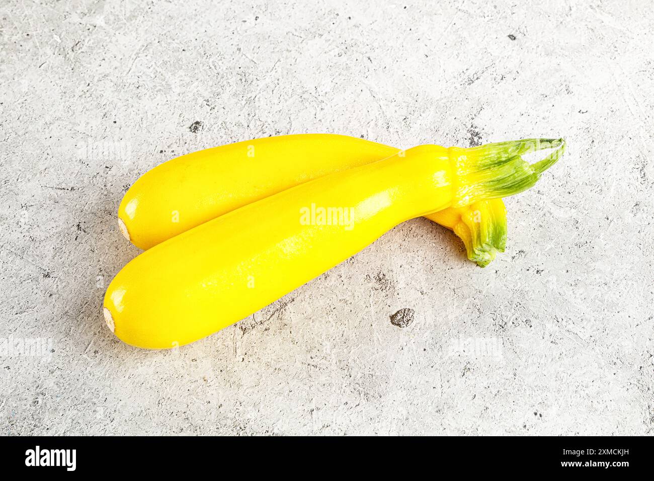 Two Yellow young zucchini for cooking Stock Photo - Alamy